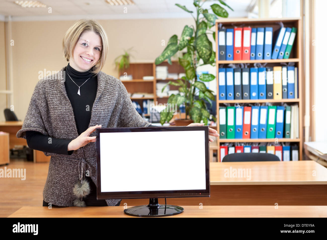 Office worker holding monitor with white isolated screen Stock Photo ...