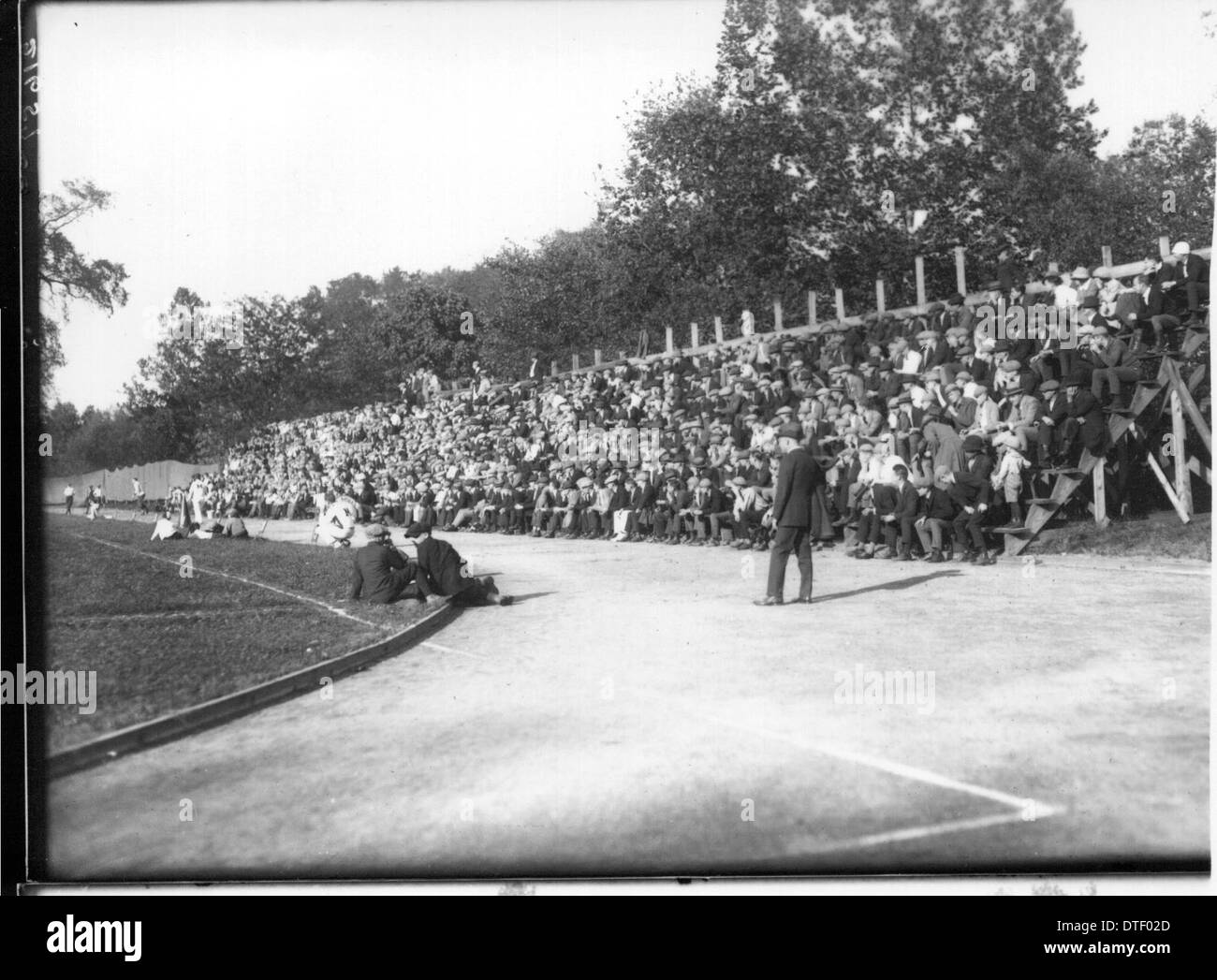 This 1922 photograph captures spectators at the Miami University versus ...