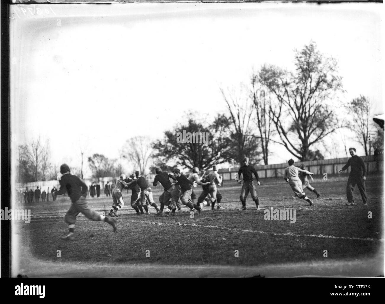 A photograph capturing the action at the Miami-Wittenberg football game ...