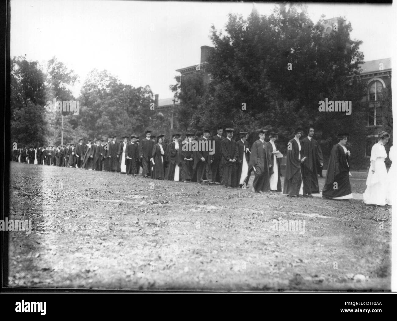 This photograph captures a procession during the 1914 commencement ...