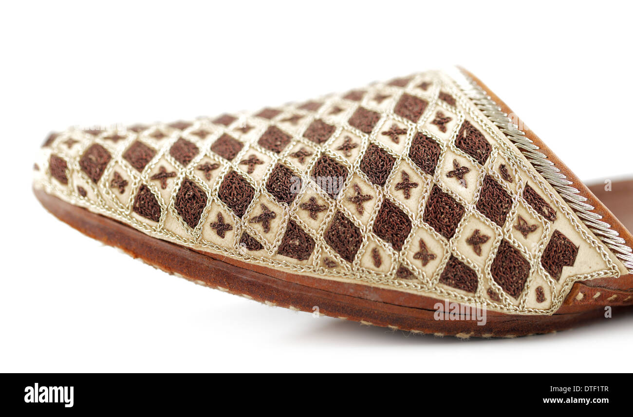 Traditional Arabic slippers shot against a white background Stock Photo ...