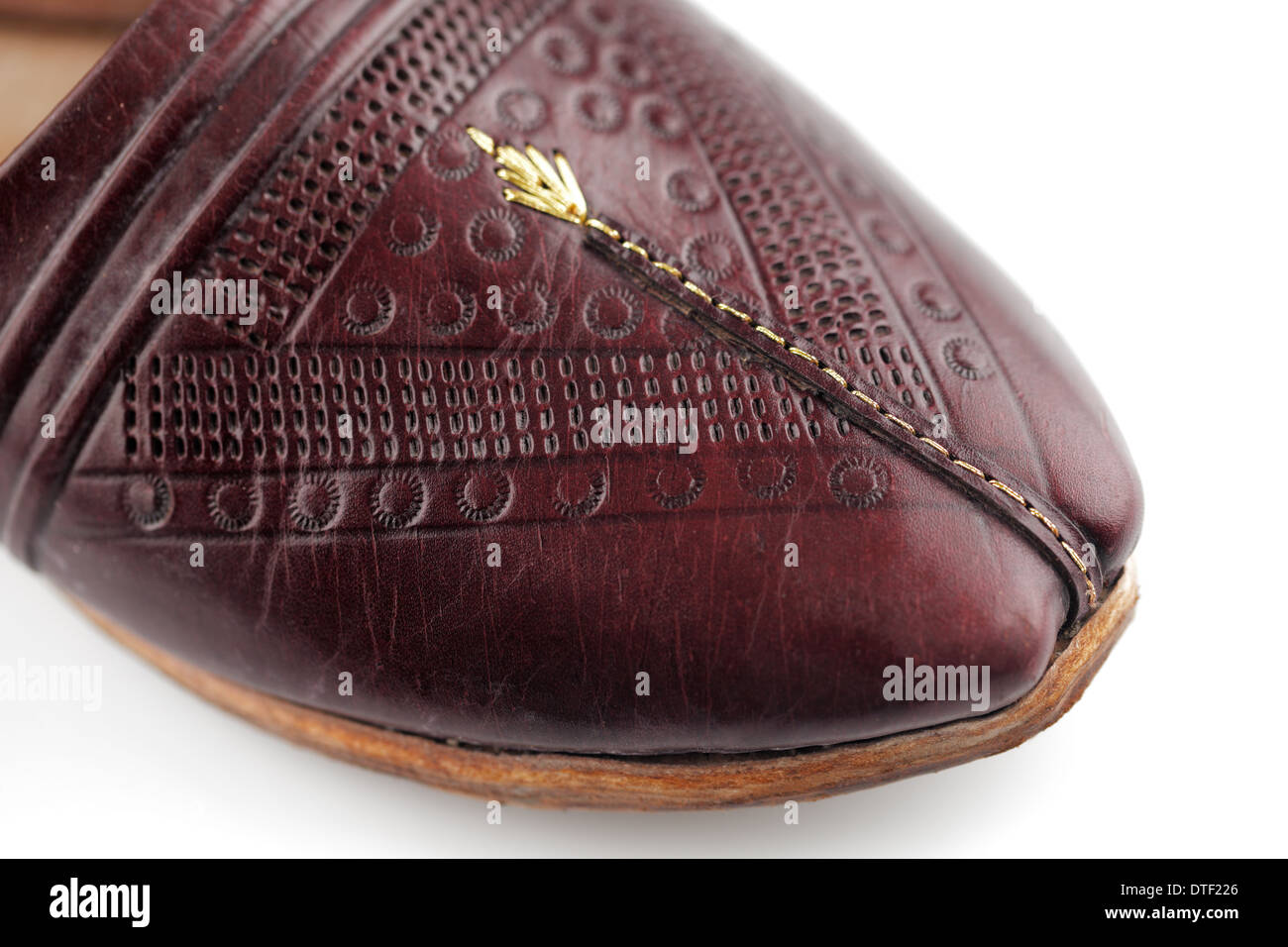Traditional Arabic slippers shot against a white background Stock Photo ...