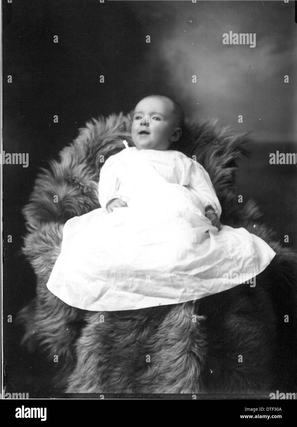 This 1912 portrait photograph features A. K. Murry as a baby, capturing ...