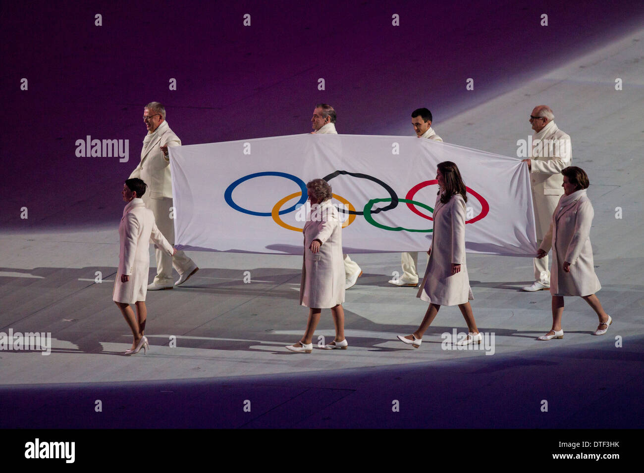 The Olympic Flag enters during the Opening Ceremonies at the Olympic ...