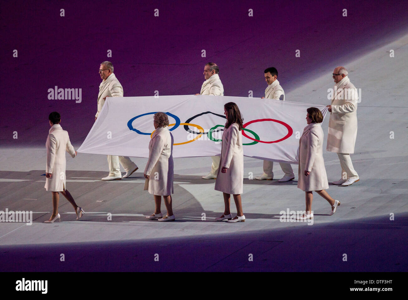 The Olympic Flag enters during the Opening Ceremonies at the Olympic ...