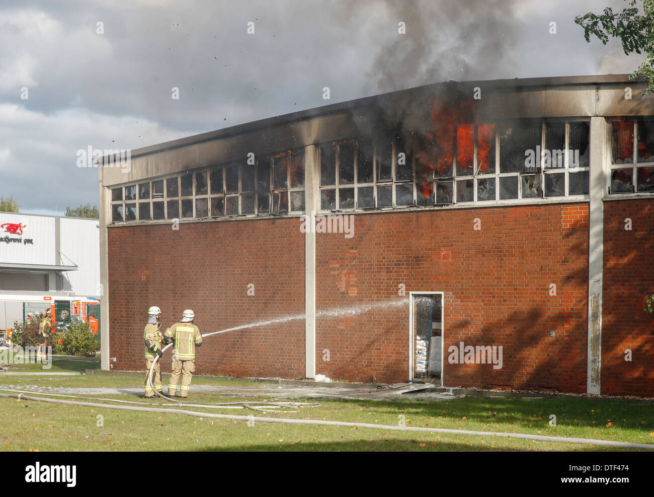 Berlin, Germany, Loesch works at a burning warehouse Stock Photo - Alamy