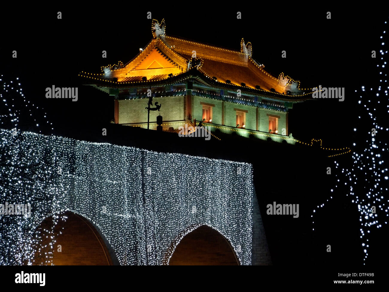 night scenery showing part of the illuminated city wall of Xian in ...