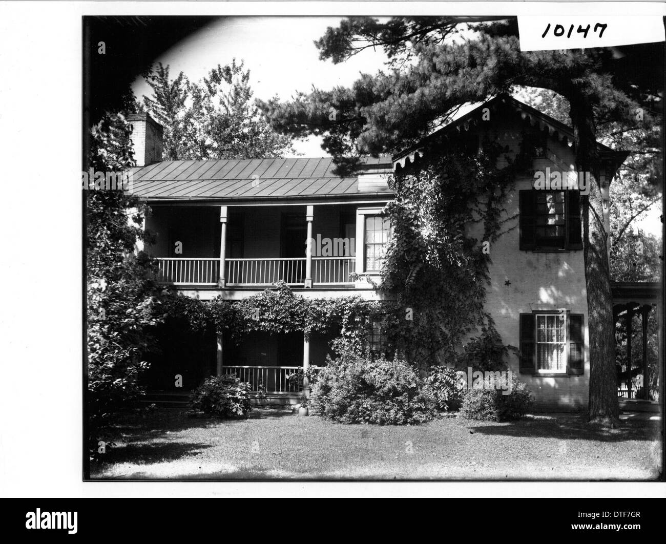 This 1910 photograph shows the McGuffey House, a historic dwelling ...