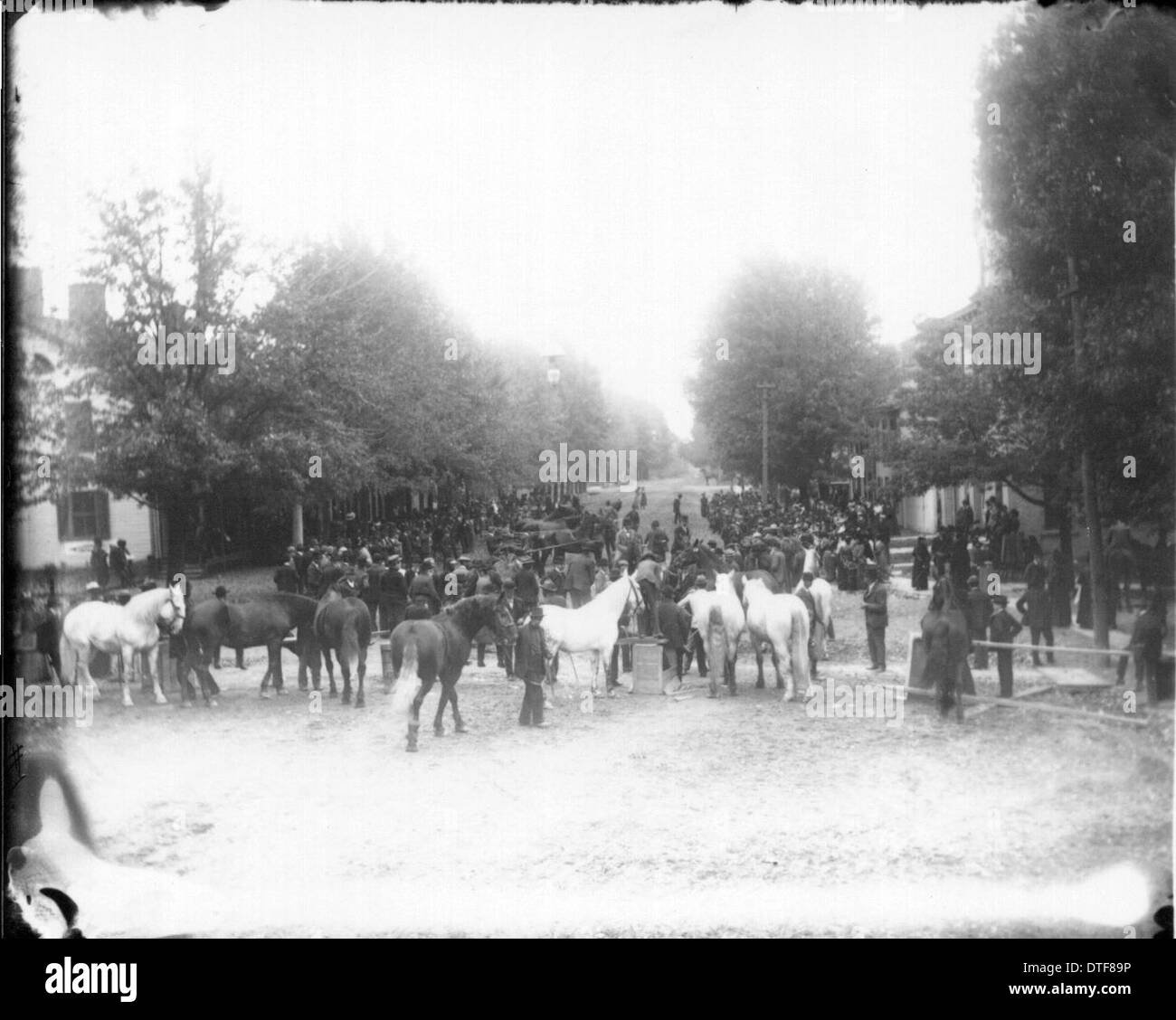This photograph captures the bustling scene at the Oxford Street Fair ...