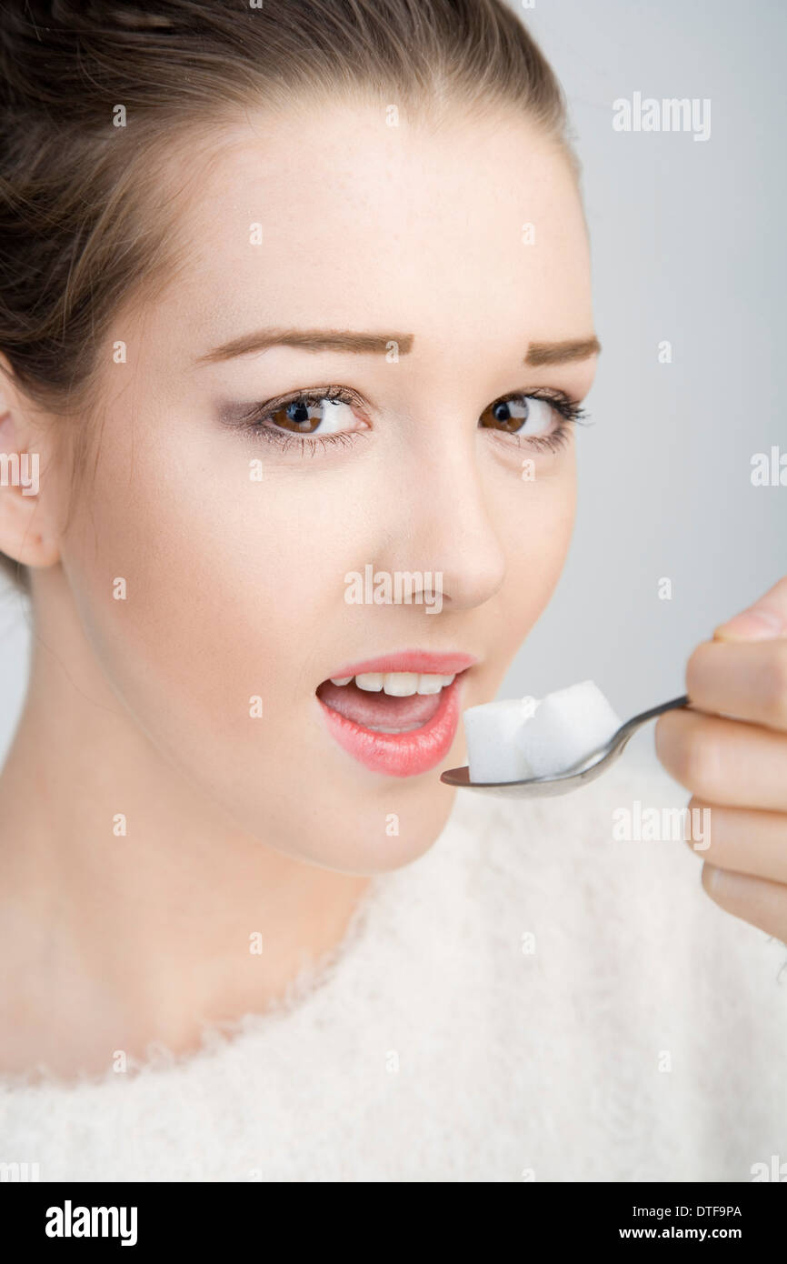 Sugar cubes eat hi-res stock photography and images - Alamy