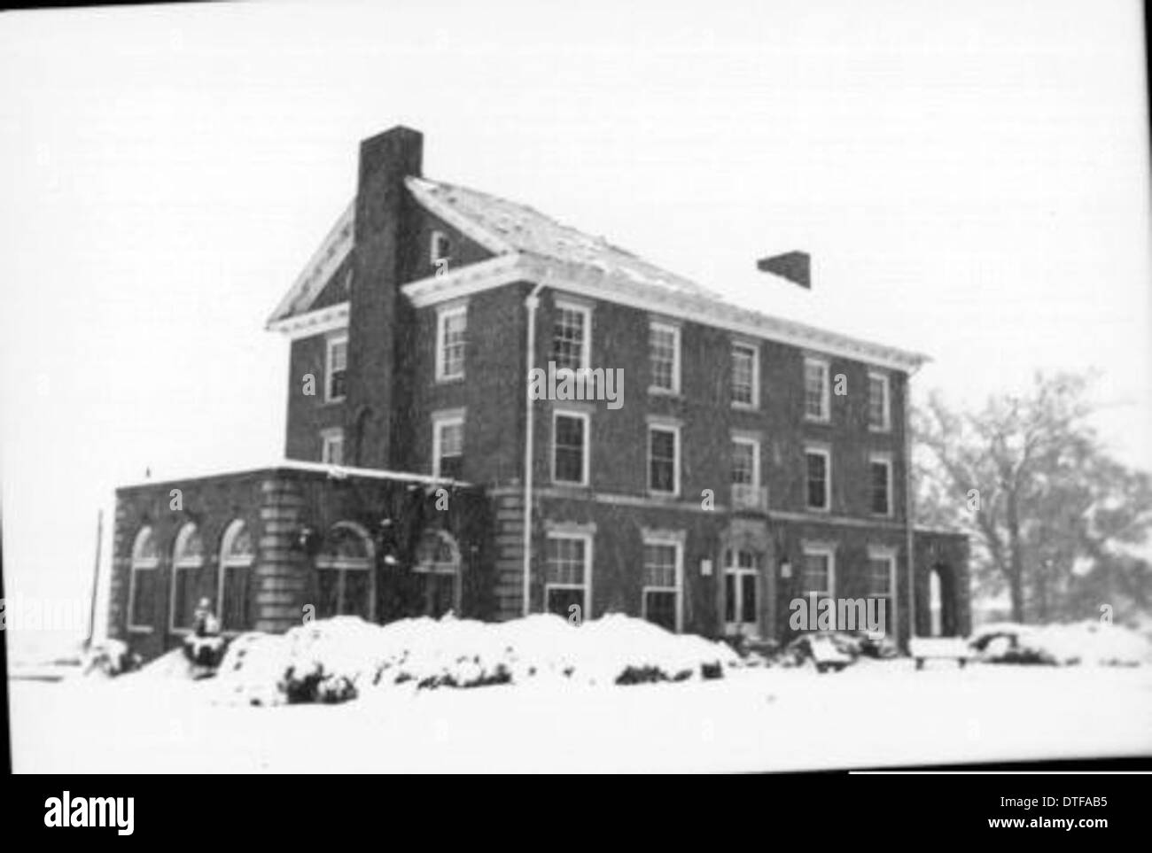 This historic photograph shows the Delta Kappa Epsilon fraternity house ...