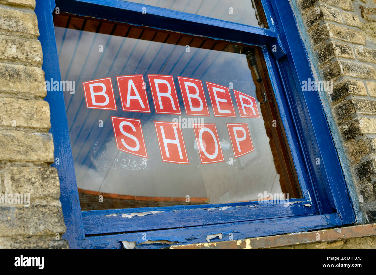 Window signage for barber's shop Stock Photo - Alamy