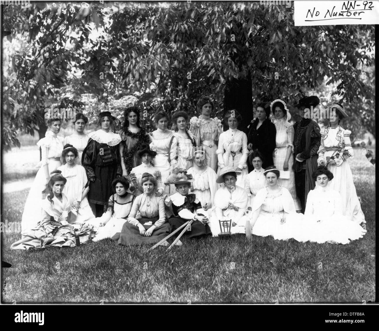 This early 20th-century photograph shows a group portrait of Class Day ...