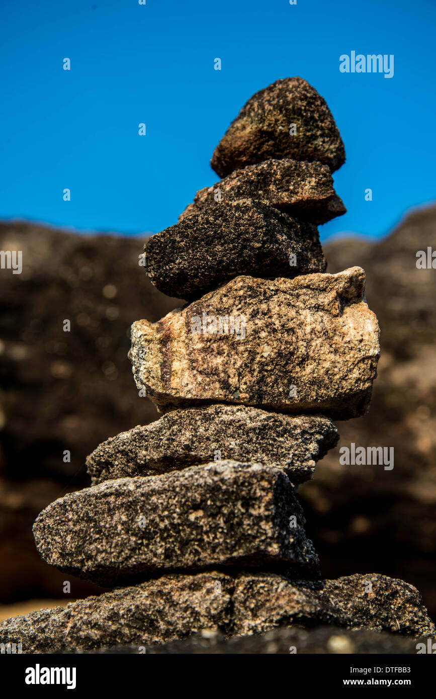 Stone heap and blue sky on the mountain in Thailand Stock Photo - Alamy