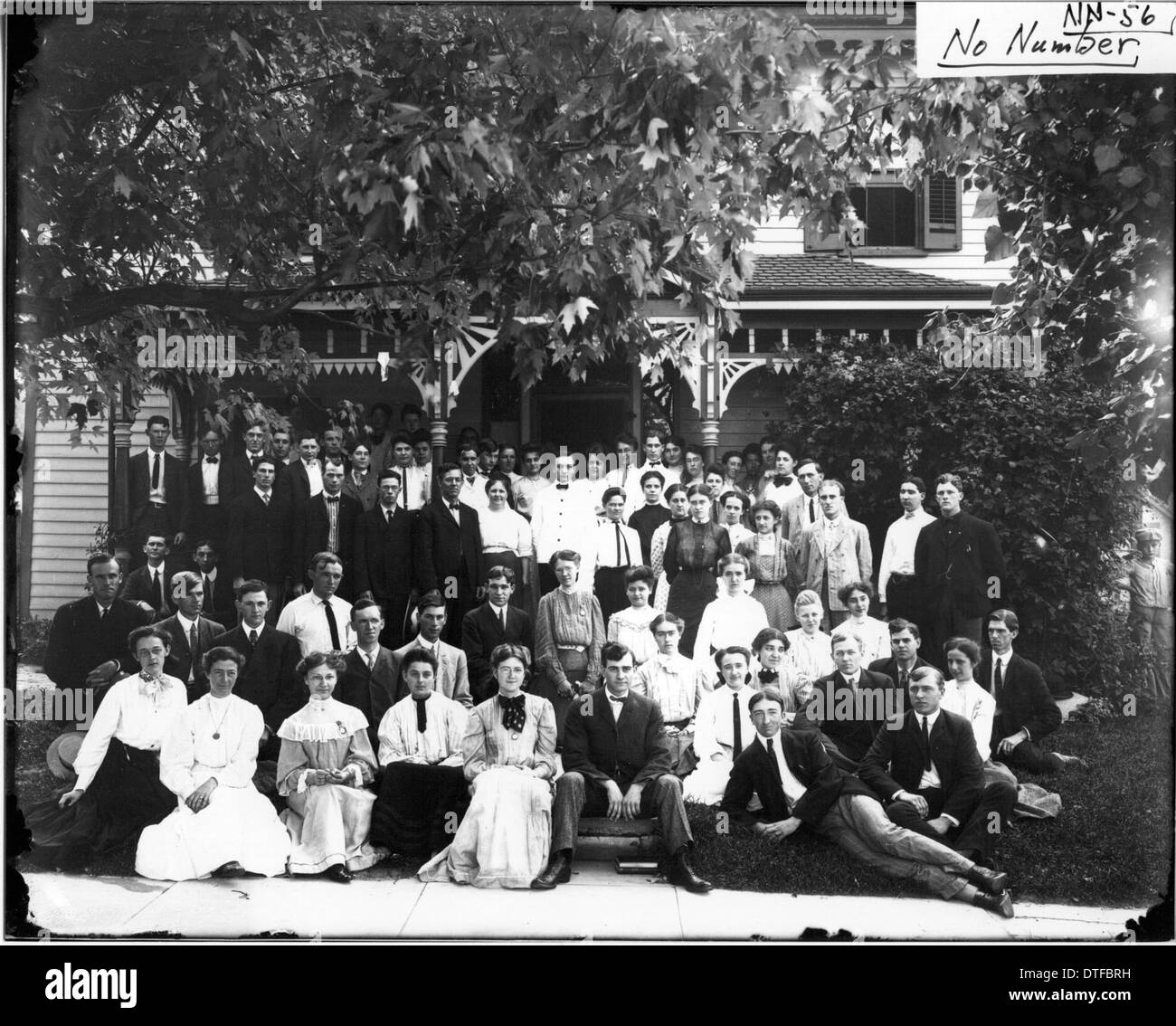 Family portrait in front of house Black and White Stock Photos & Images ...