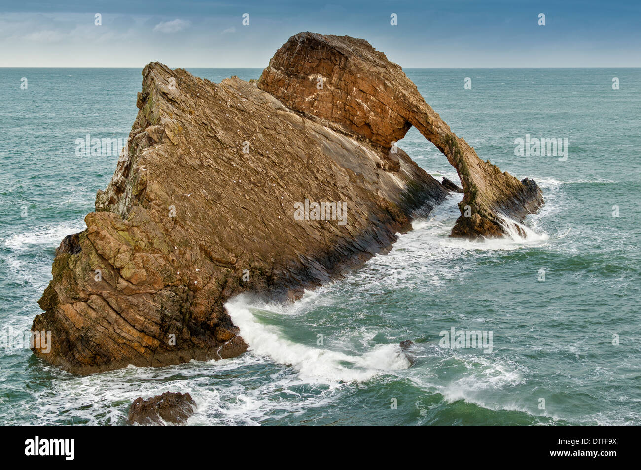 BOW FIDDLE ROCK NEAR PORTKNOCKIE AND A STORMY SEA NORTH EAST COAST ...