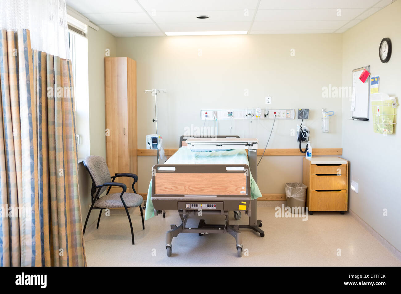 Hospital Room With Bed And Chair Stock Photo - Alamy