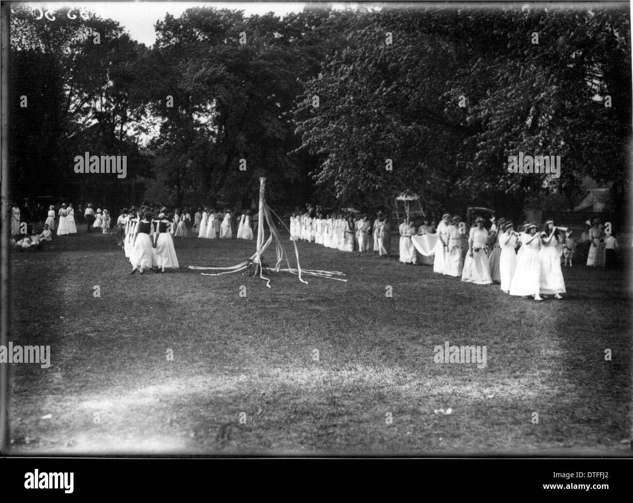 This historical photograph captures the May Day celebration at Oxford ...