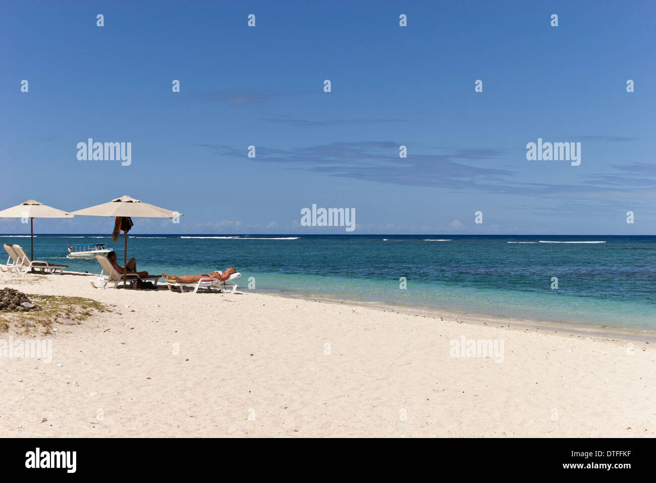 Sunbathing on a sandy beach, Mauritius Stock Photo - Alamy