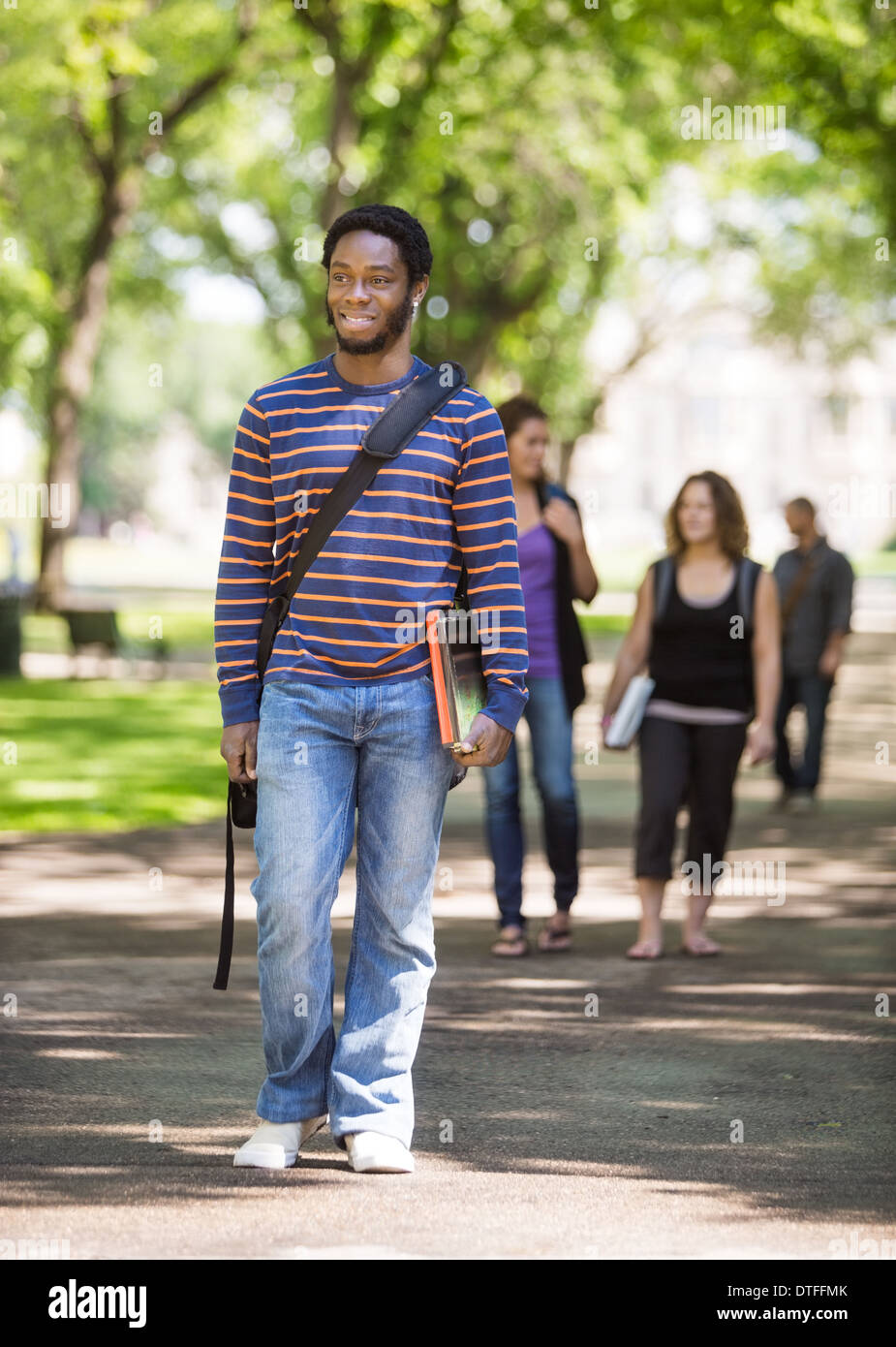 Handsome college student on campus hi-res stock photography and images ...