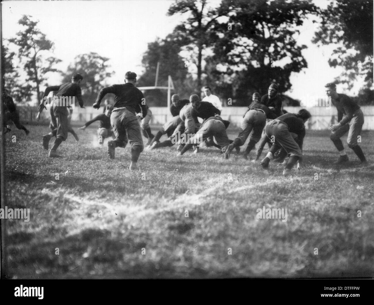 This historical photograph captures the 1913 football game between ...
