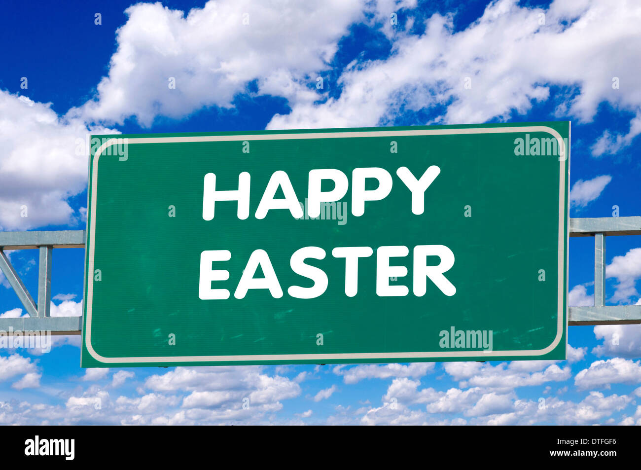 Happy Eastern green road sign with clouds in background Stock Photo - Alamy