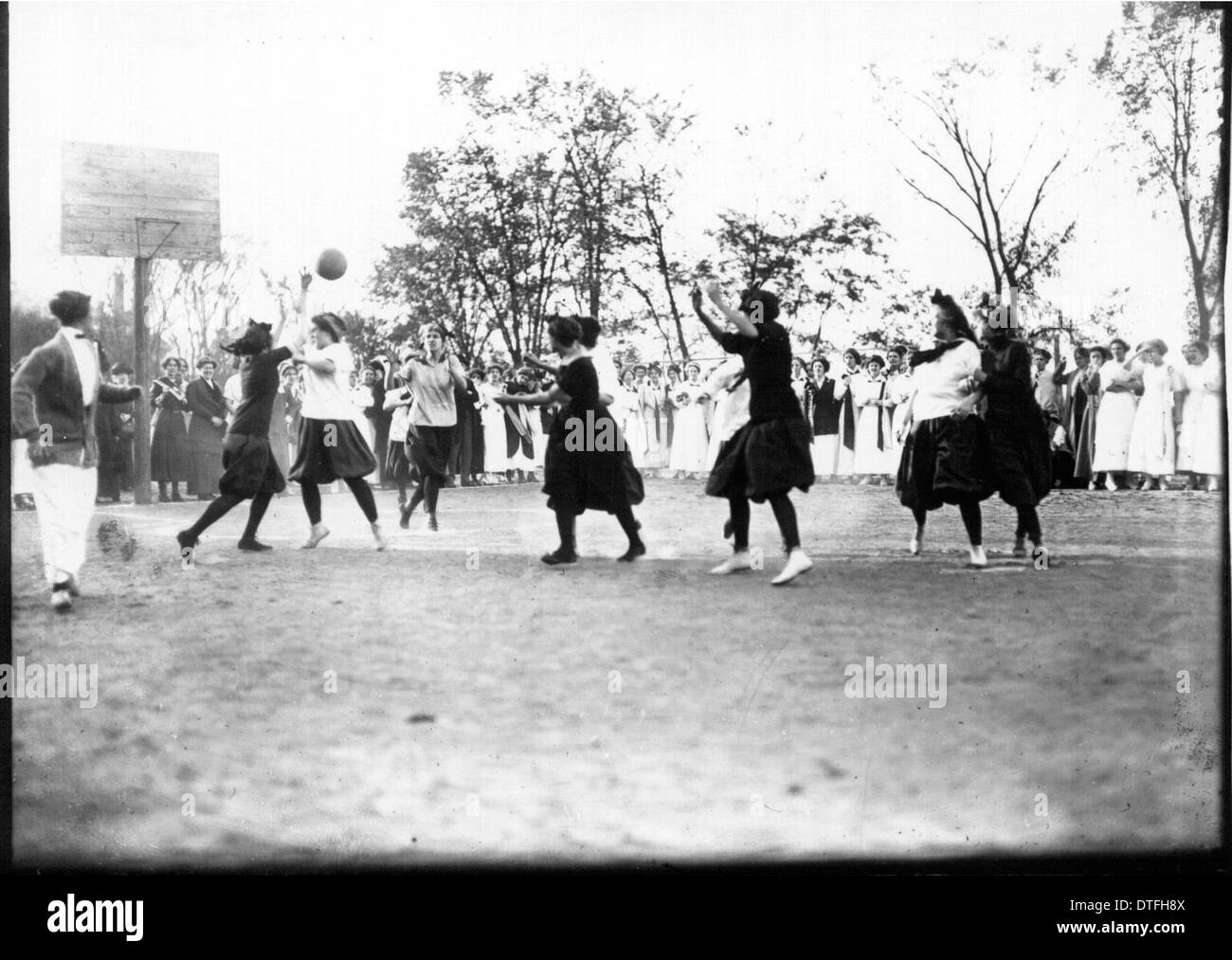 This historical photograph from 1912 shows basketball players at ...