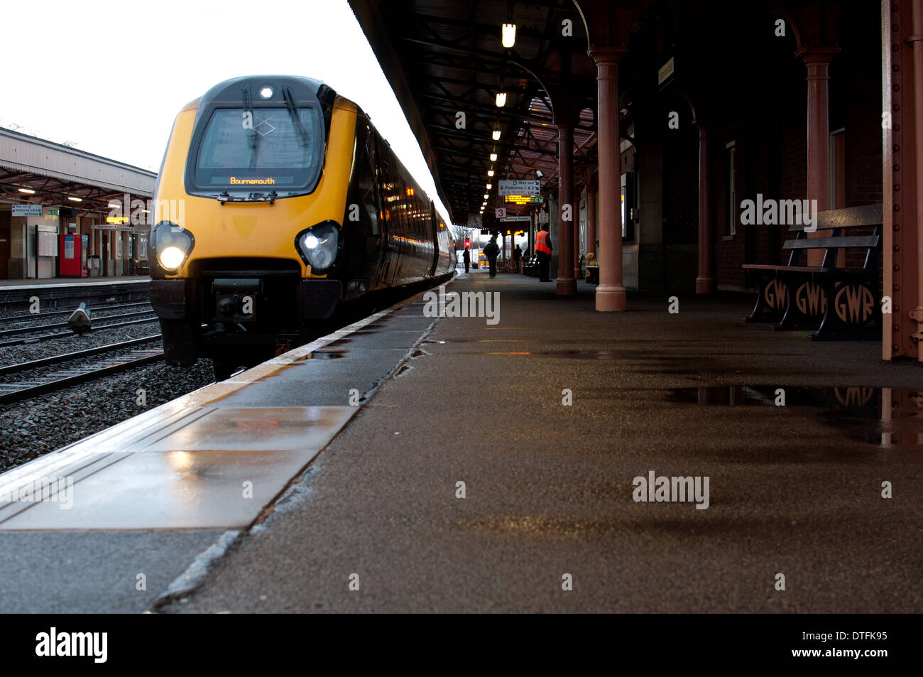 CrossCountry Voyager train at Leamington Spa station, UK. Wet weather ...