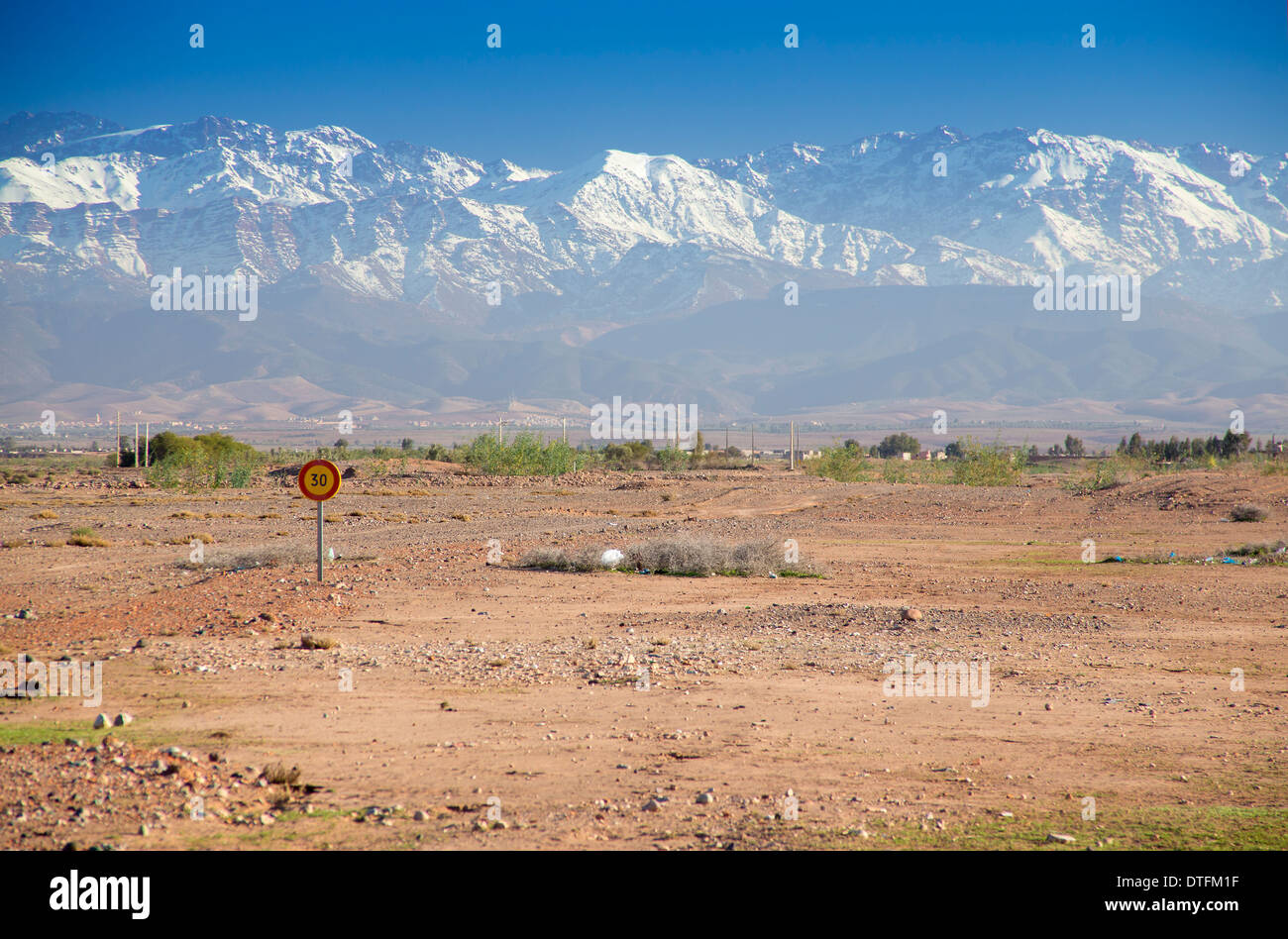 Atlas mountains desert and speed limit sign Stock Photo - Alamy
