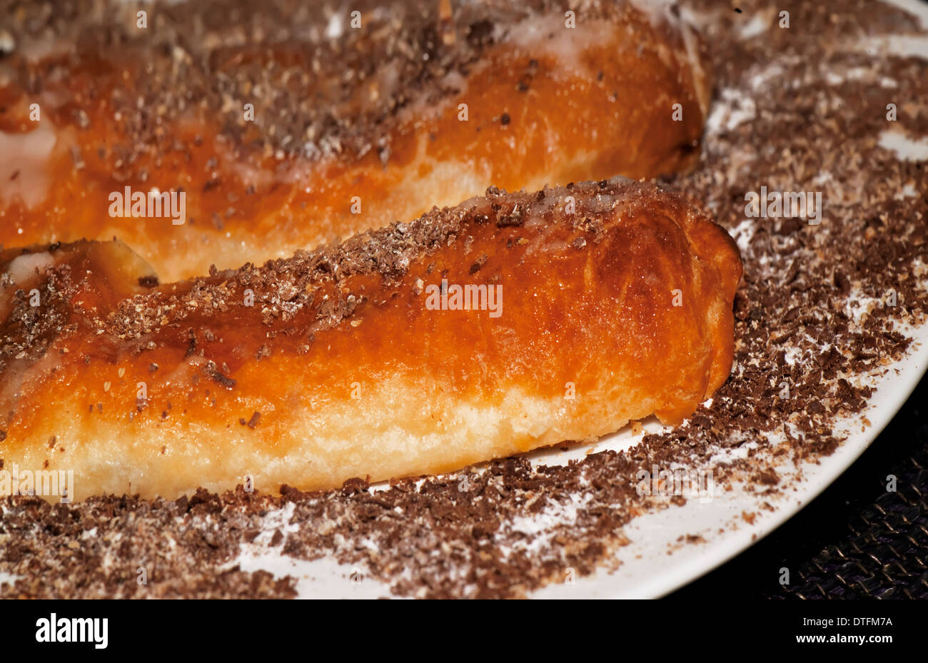 Glazed pastries on a plate Stock Photo - Alamy