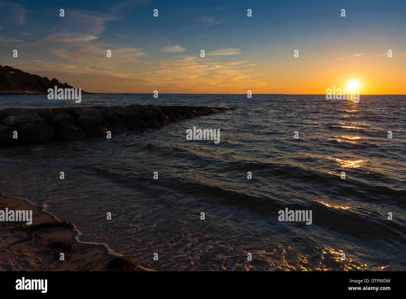 Sunset over Atlantic Ocean on Old Silver Beach, Cape Cod, Massachusetts ...