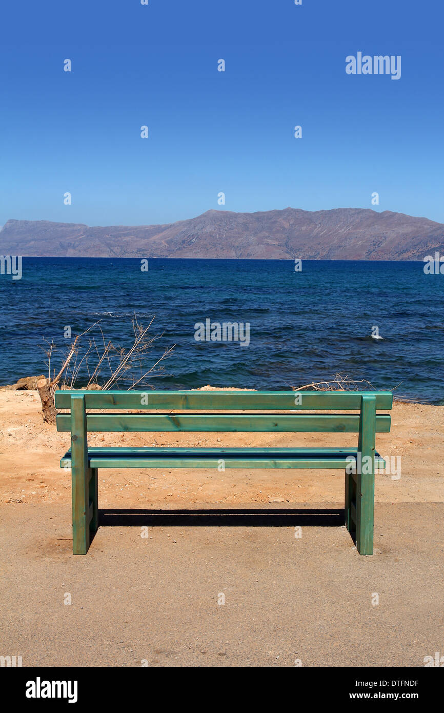 Empty bench overlooking calm sea bench hi-res stock photography and ...