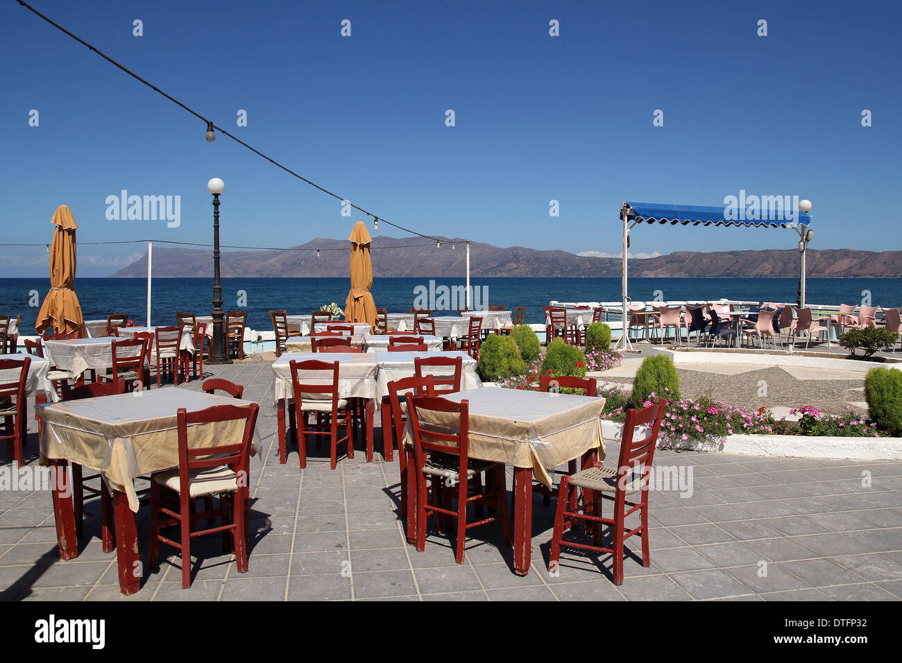 Restaurant on the seaside in Crete, Greece Stock Photo - Alamy