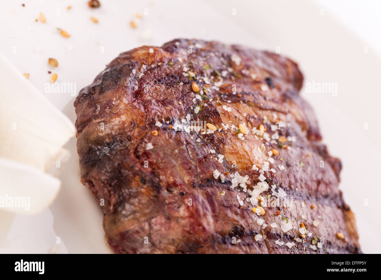 Delicious trimmed lean portion of thick grilled beef steak with ...