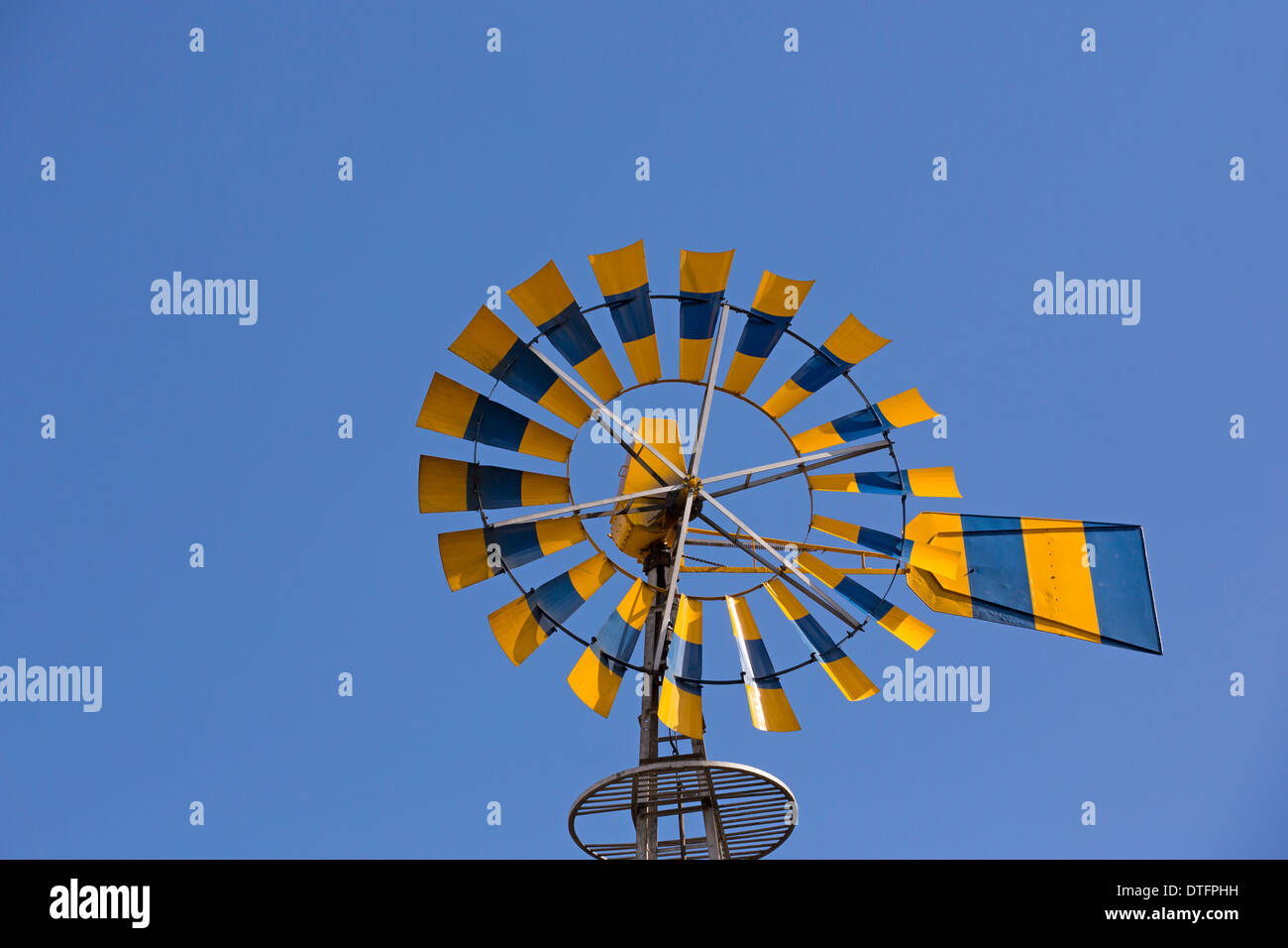 windmill colors color blue sky Stock Photo - Alamy