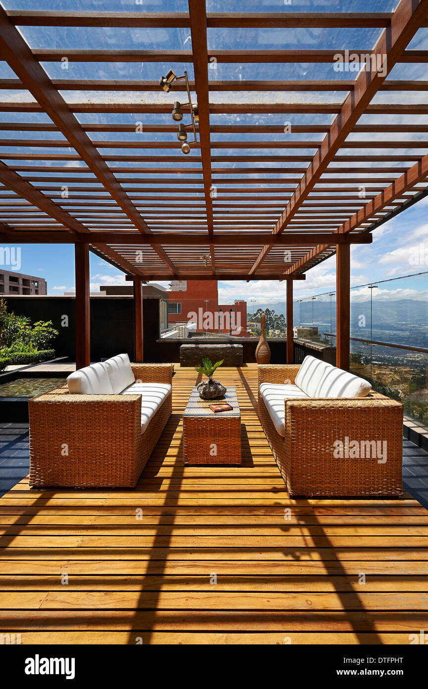 Interior design: Beautiful terrace lounge with pergola Stock Photo - Alamy