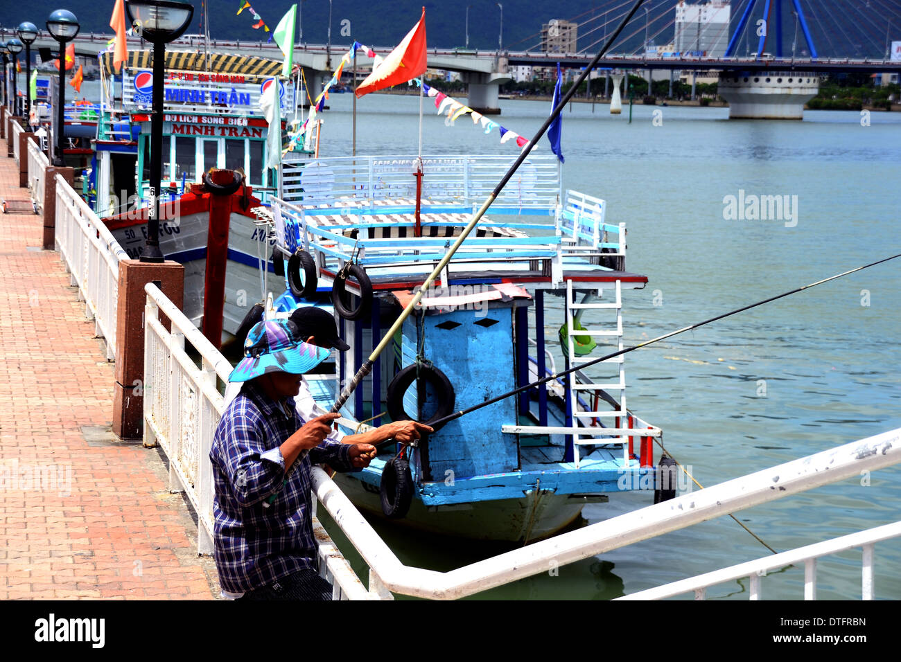 fishermen fishing at Han River in Danang Vietnam Stock Photo - Alamy