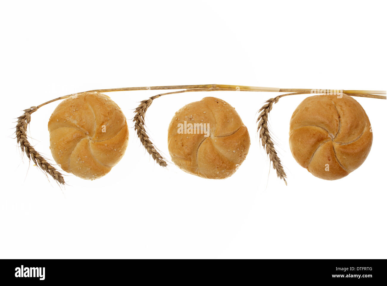 Round Breads and wheat cereal crops. isolated on white Stock Photo - Alamy