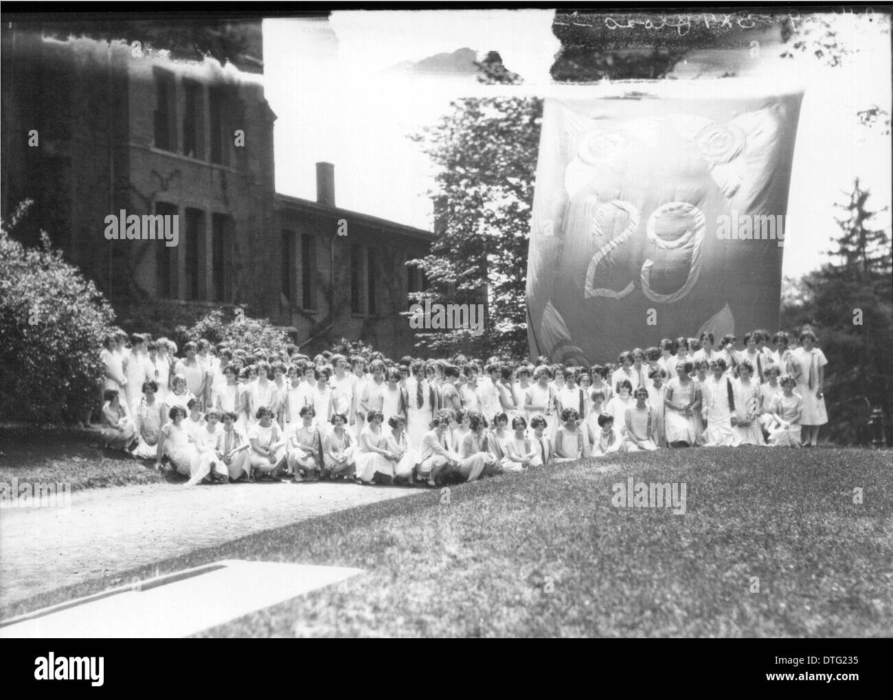 This historical photograph from 1926 captures a group portrait during ...