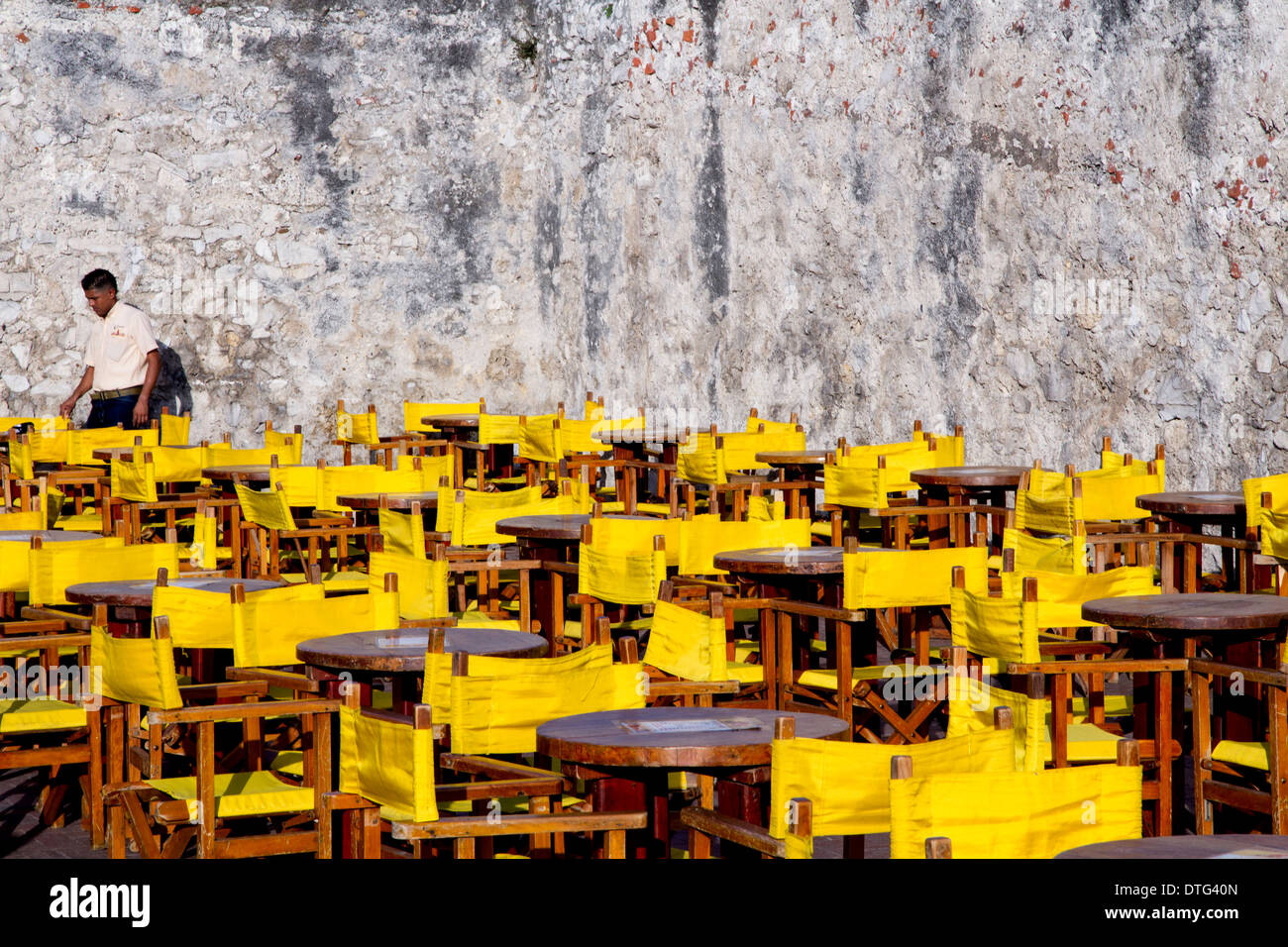Setting tables in the old town, Cartagena, Colombia Stock Photo - Alamy