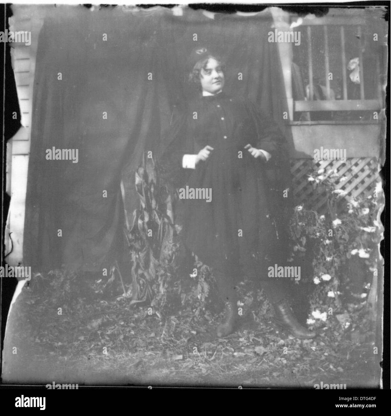 This portrait photograph depicts a woman from an unknown time period ...