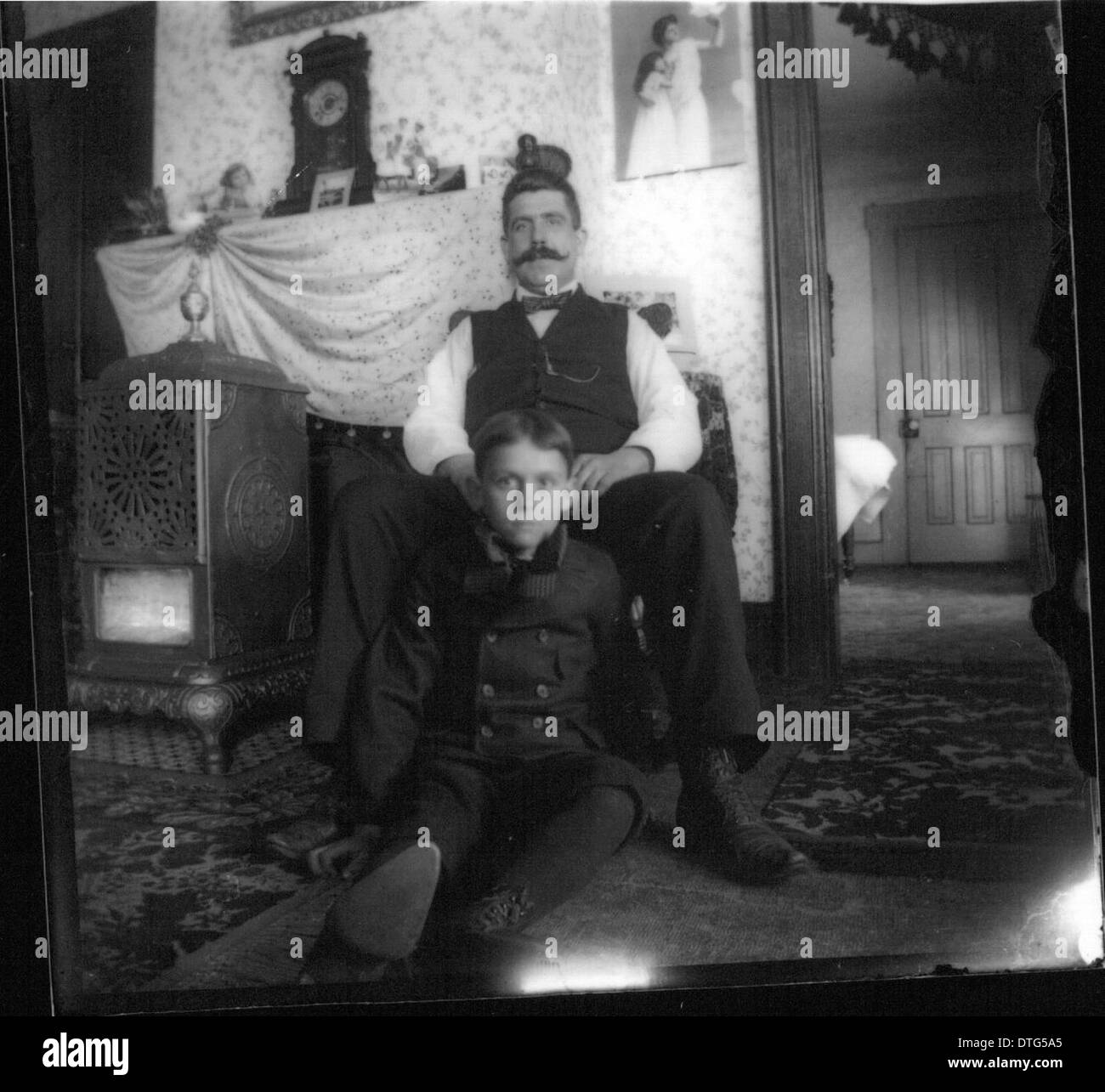 Family inside a house Black and White Stock Photos & Images - Alamy