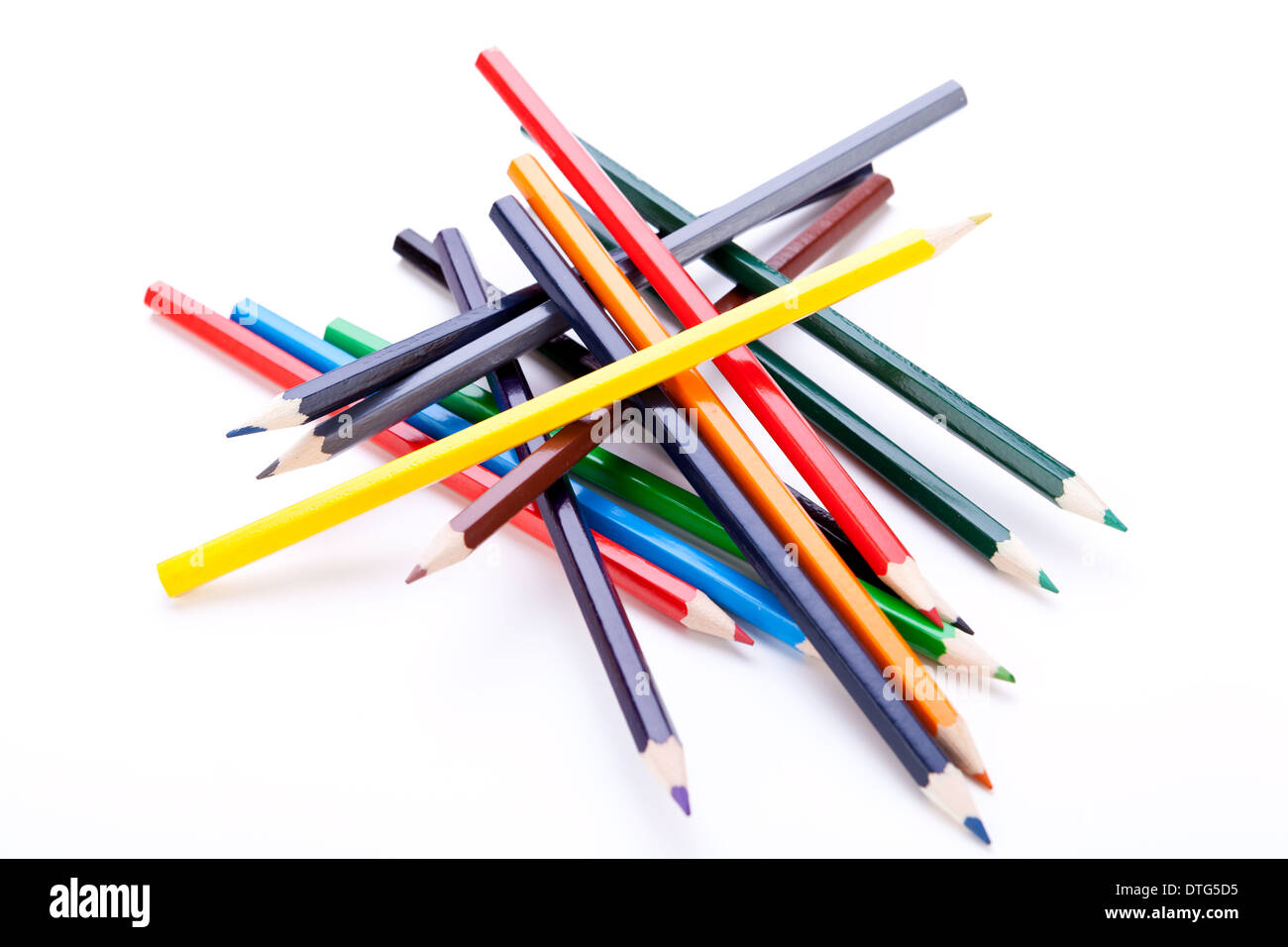 Bunch of sharpened wooden colourful pencil crayons in the colours of ...