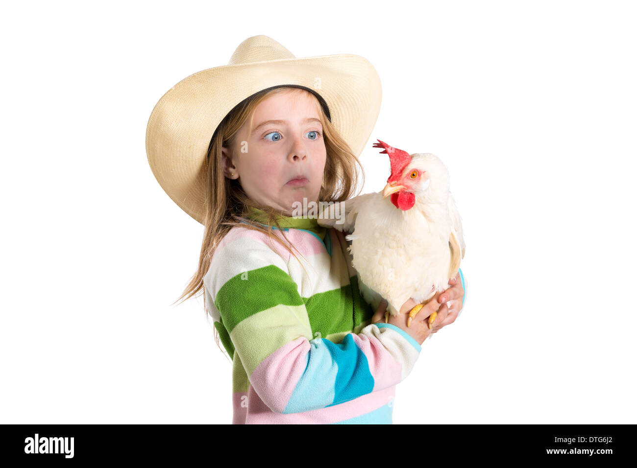 Funny kid girl expression surprised gesture scared about hen on white ...