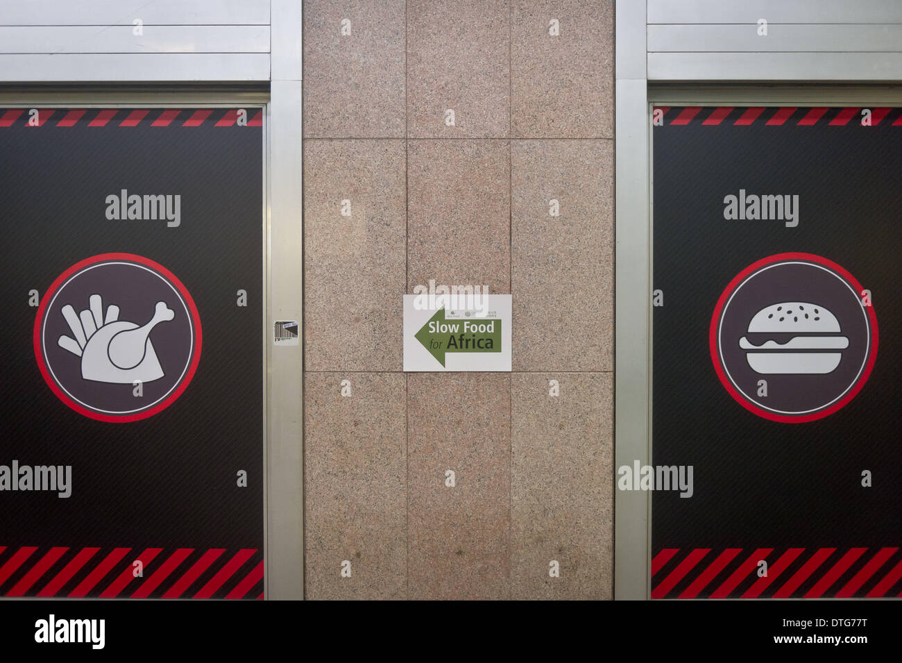 Milan, Italy. 17th Feb, 2014. The banner of slow food vs Fast Food logo ...