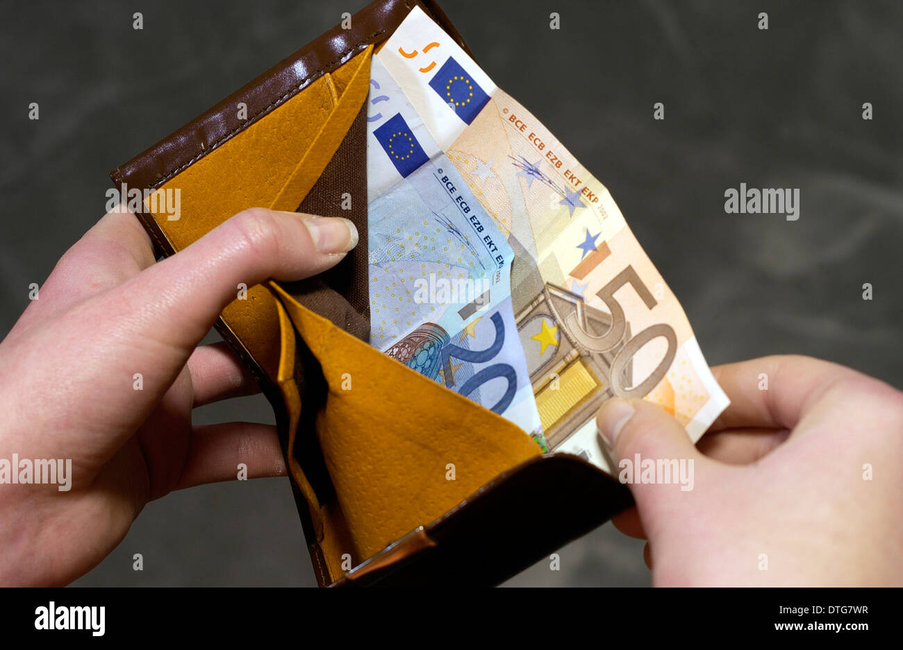 Wallet with banknotes Stock Photo - Alamy