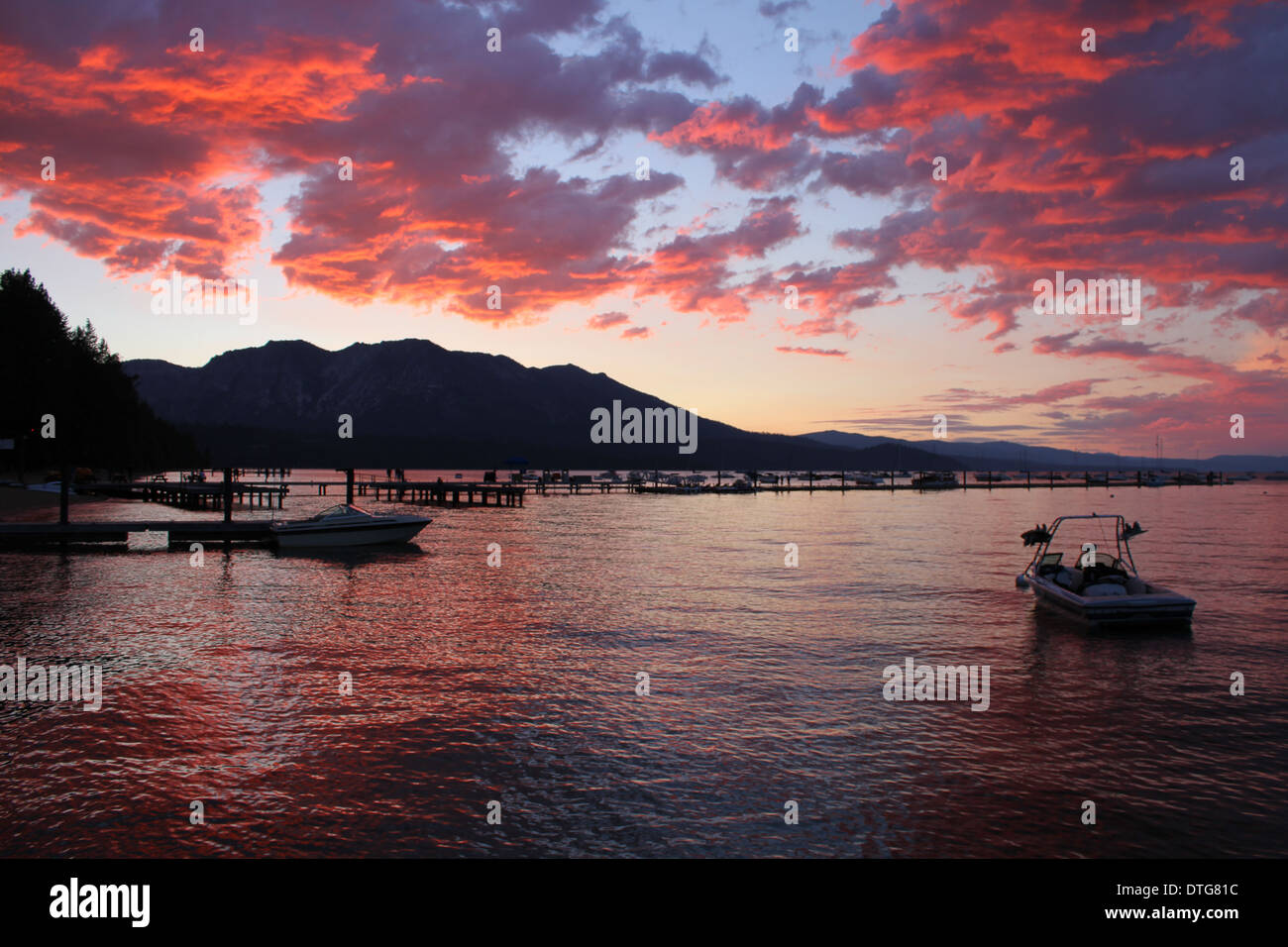 A vibrant South Lake Tahoe sunset in the month of August Stock Photo ...