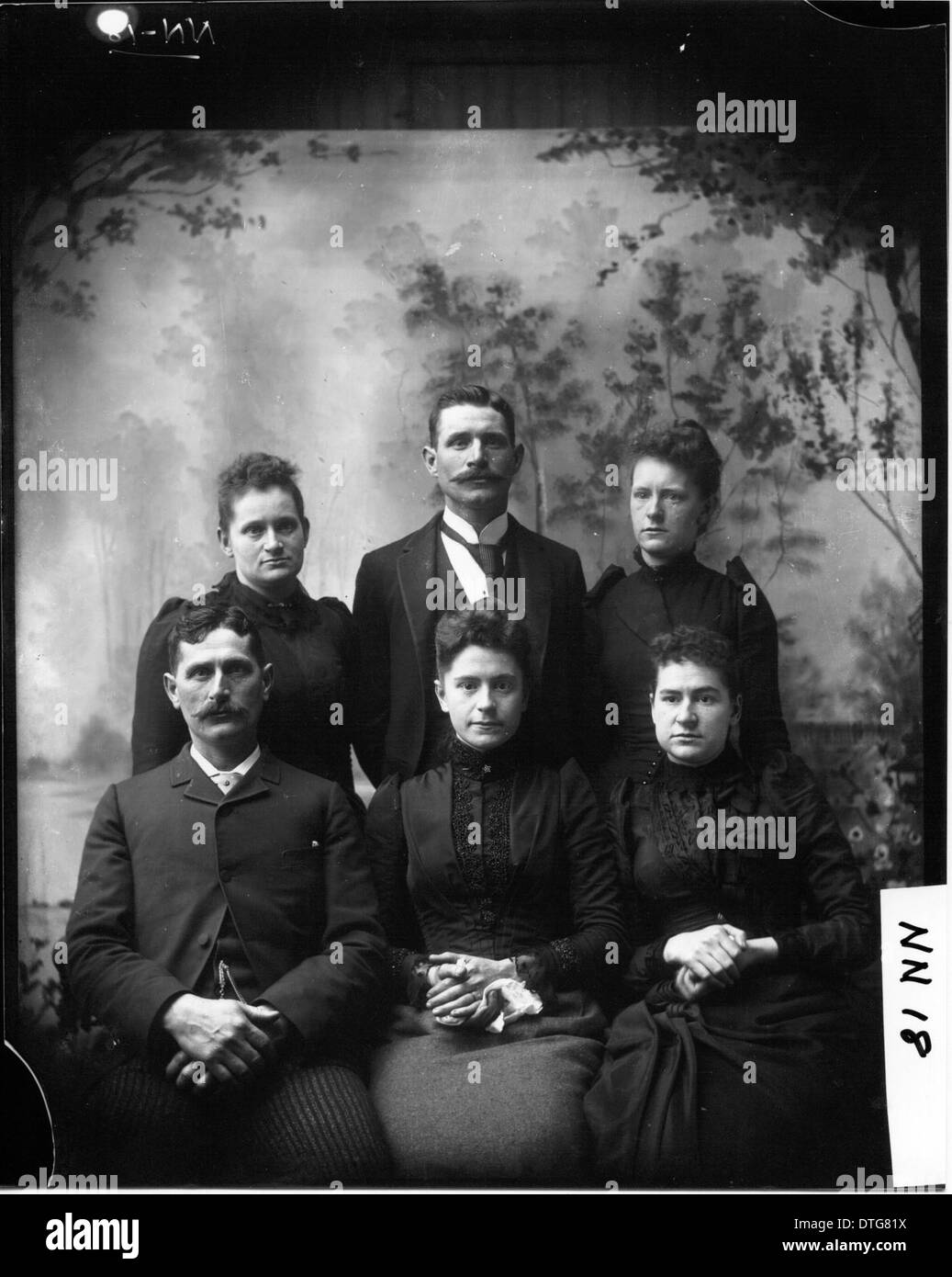 Four men in attire Black and White Stock Photos & Images - Alamy