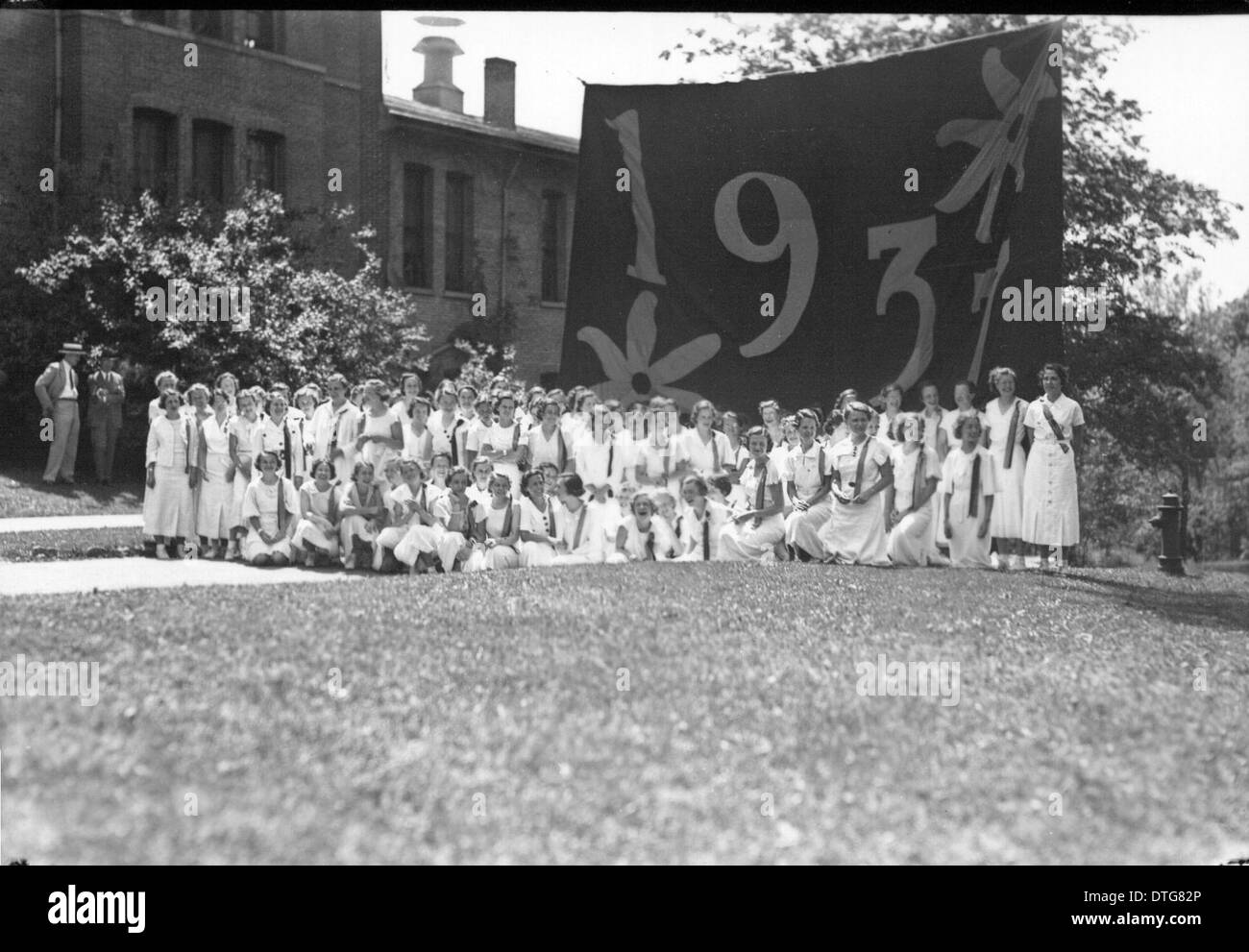 This historical photograph from 1934 captures a group portrait during a ...