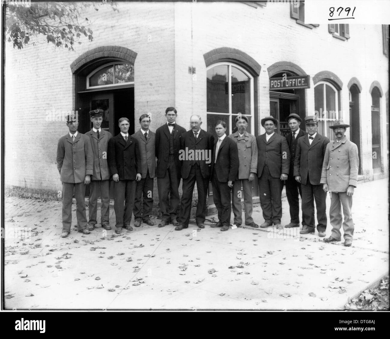 Post office employees in front of post office 1908 Stock Photo - Alamy